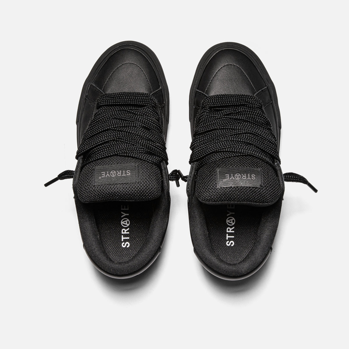 STRAYE Logan Puff Blackout full-grain leather — puffy low-top skate shoe
